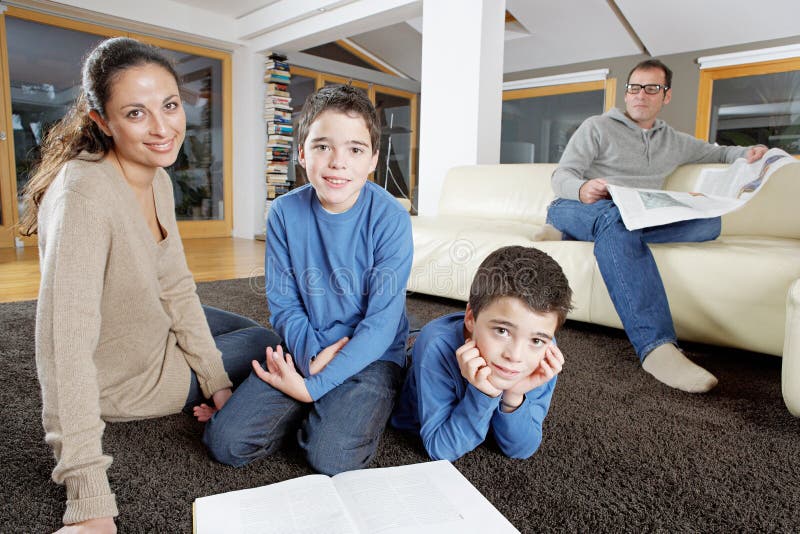 Family reading on weekend stock photo. Image of children - 28941206