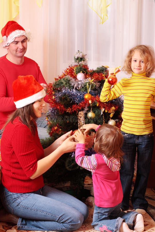 Family in Red Christmas Hat Stock Image - Image of adult, baby: 7282351