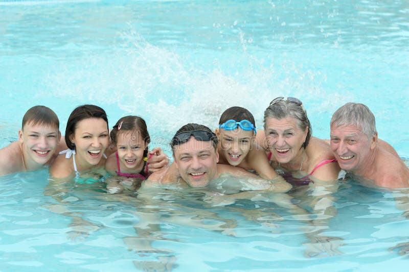 Family relax in pool stock image. Image of relax, mother - 56521627