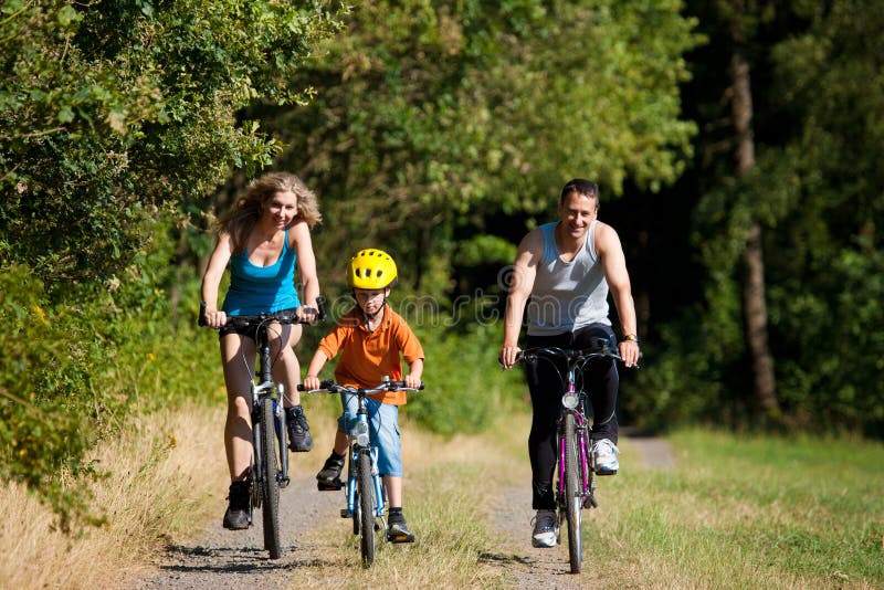 Family Riding Bicycles for Sport Stock Image - Image of sunlight ...