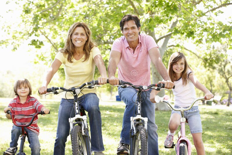 Family riding bikes stock image. Image of outside, cycle - 54959719