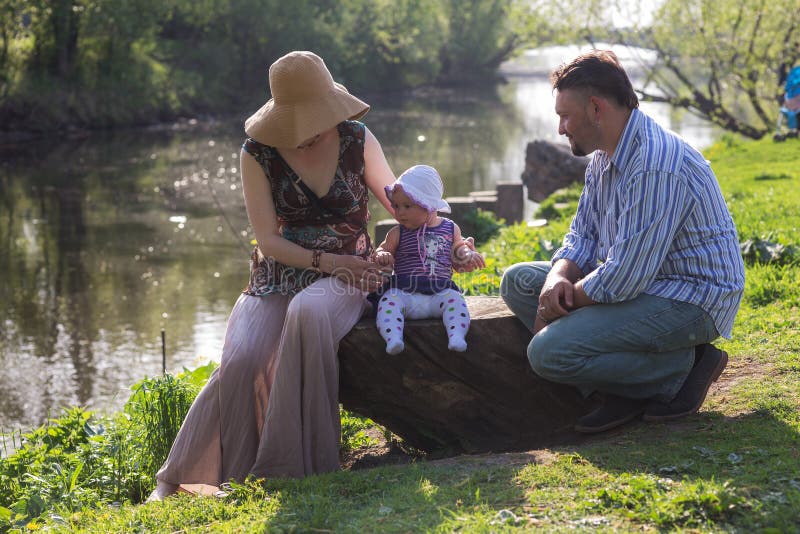 Family by the river stock photo. Image of leisure, caucasian - 131283350