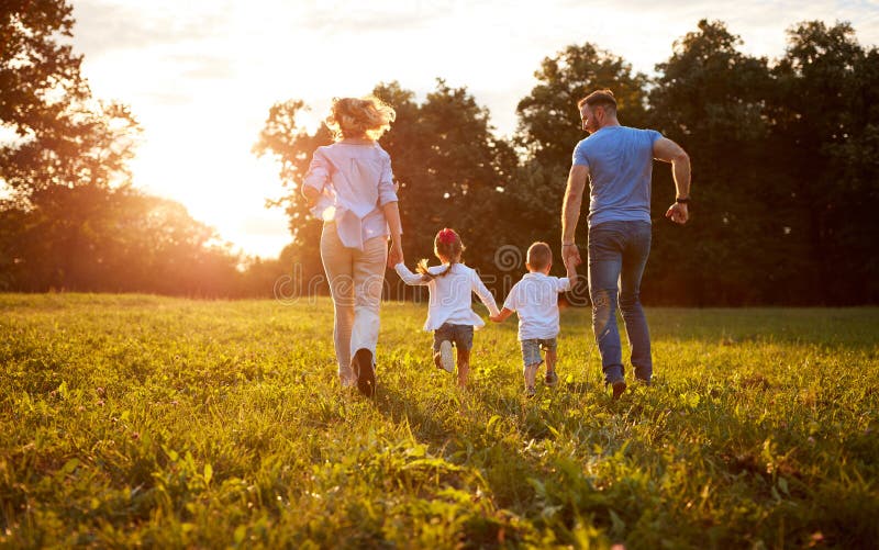 Family Running with Children in Nature, Back View Stock Image - Image ...
