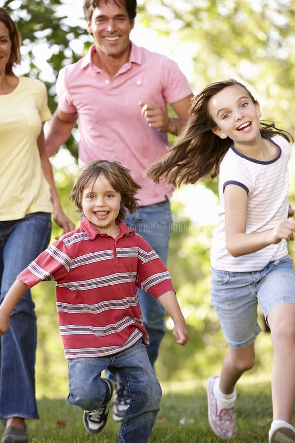 Family running in park stock photo. Image of lifestyle - 55893692