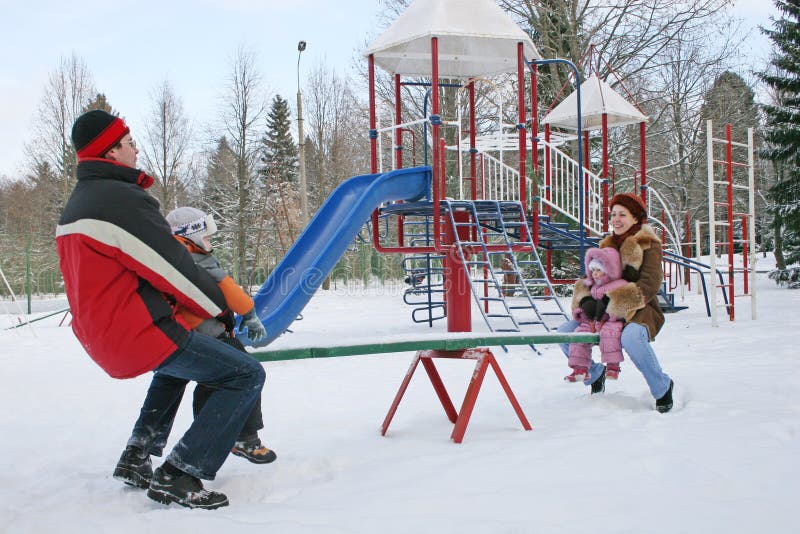 Child on playground seesaw stock image. Image of little - 18652391