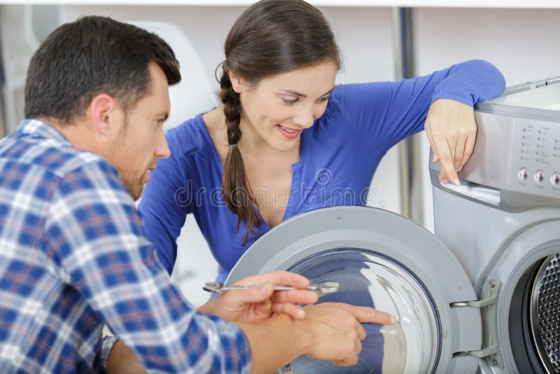 Family Selecting Modern Washing Machine in Hypermarket Stock Photo ...