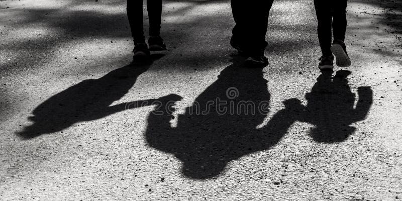 Shadow Of A Family With Two Teens