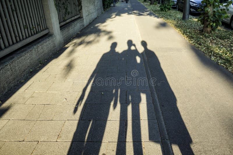 Family shadow silhouette stock photo. Image of holding - 19892832