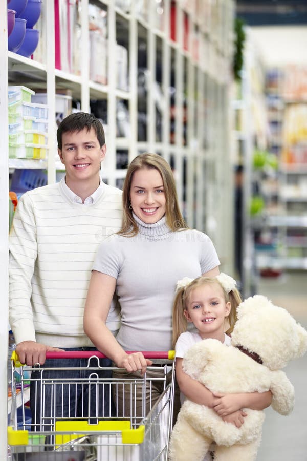 Family of four in shop stock photo. Image of baby, shop - 1355874