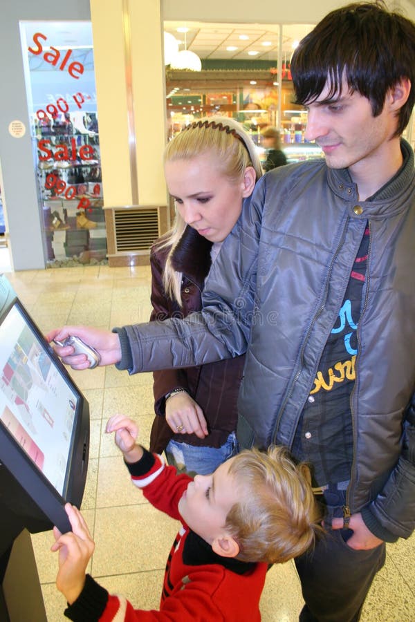 Family and shop computer stock photo. Image of male, child - 1355910