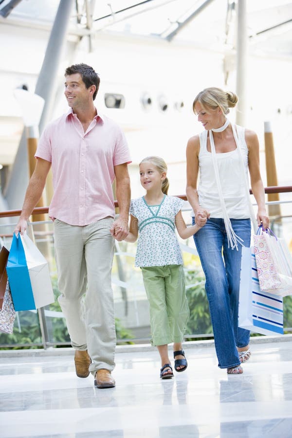 Family shopping in mall stock photo. Image of middle, four - 5210742