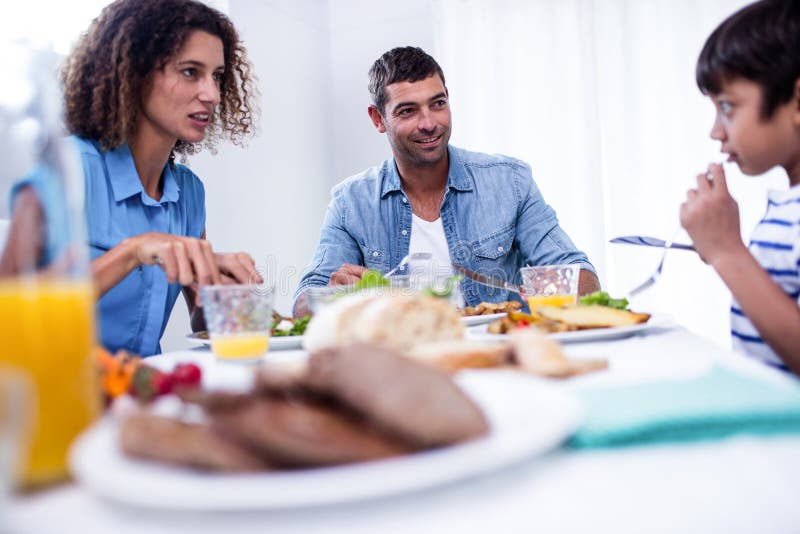 Family Sitting at Breakfast Table Stock Image - Image of domicile ...