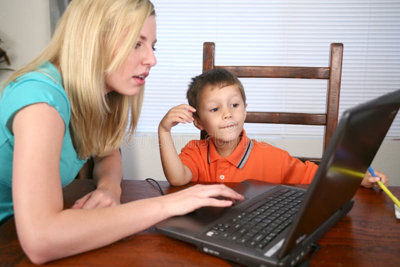 Family sitting at computer stock image. Image of person - 17407095