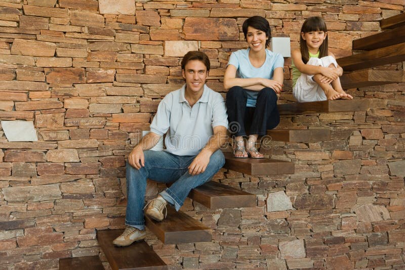 Family sitting on steps stock image. Image of belonging - 36095657
