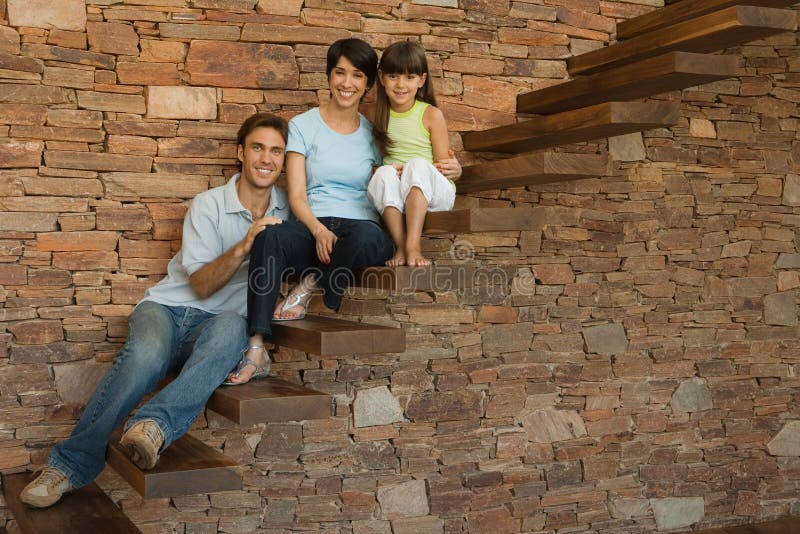 Family sitting on steps stock image. Image of daughter - 62560667
