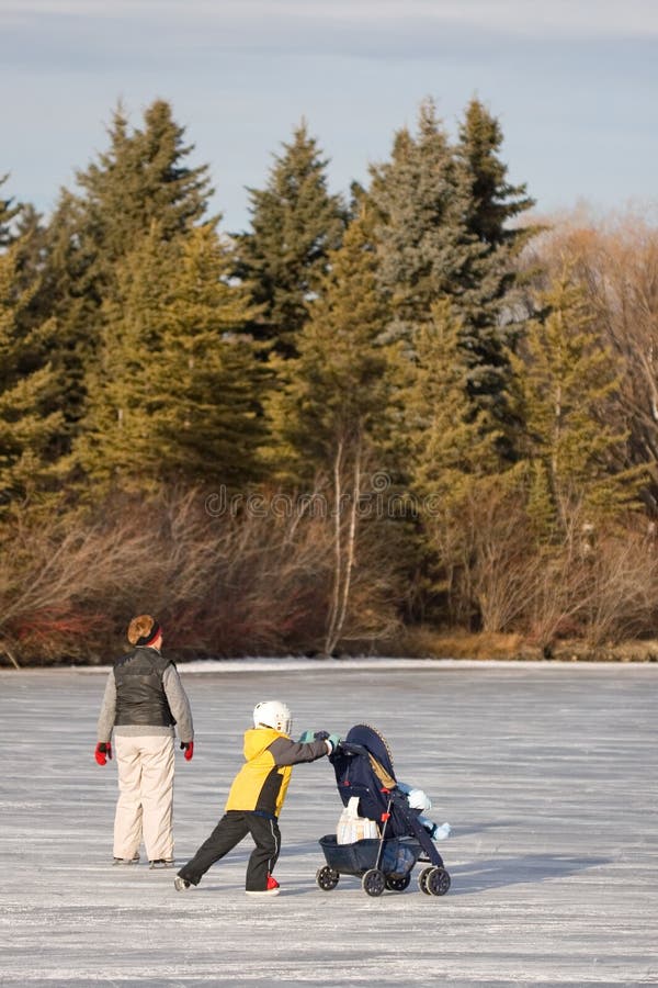 Family Skate stock image. Image of helmet, people, carriage - 421583