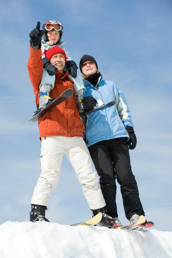 Family skiing stock image. Image of seasonal, husband - 12439817
