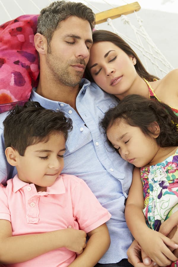 Family Sleeping in Garden Hammock Together Stock Image - Image of ...