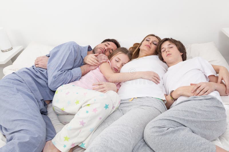 Family sleeping stock photo. Image of relaxation, lying - 62744716