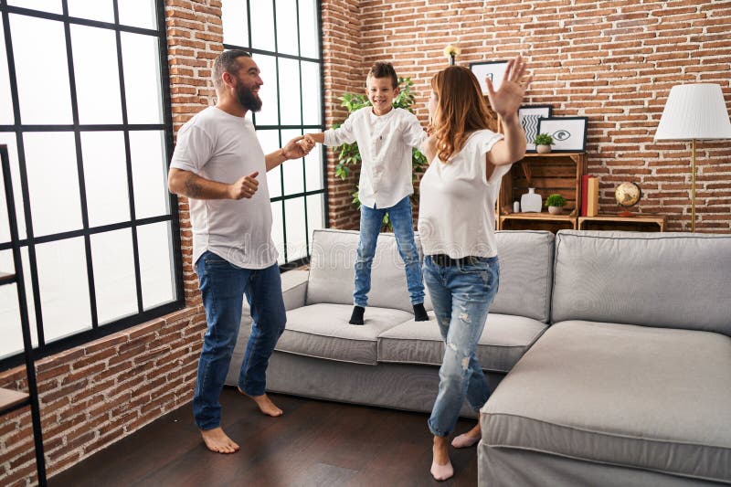 Family Smiling Confident Dancing at Home Stock Image - Image of enjoy ...