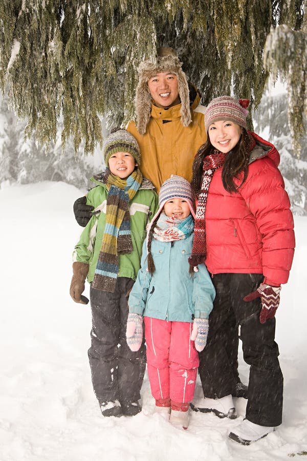 Family in the snow stock image. Image of daughter, nature - 62806491