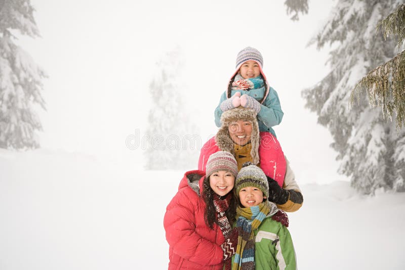 Family in the snow stock image. Image of hugging, exploration - 62806605