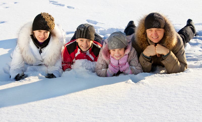 Family in the snow stock image. Image of father, happy - 45048403