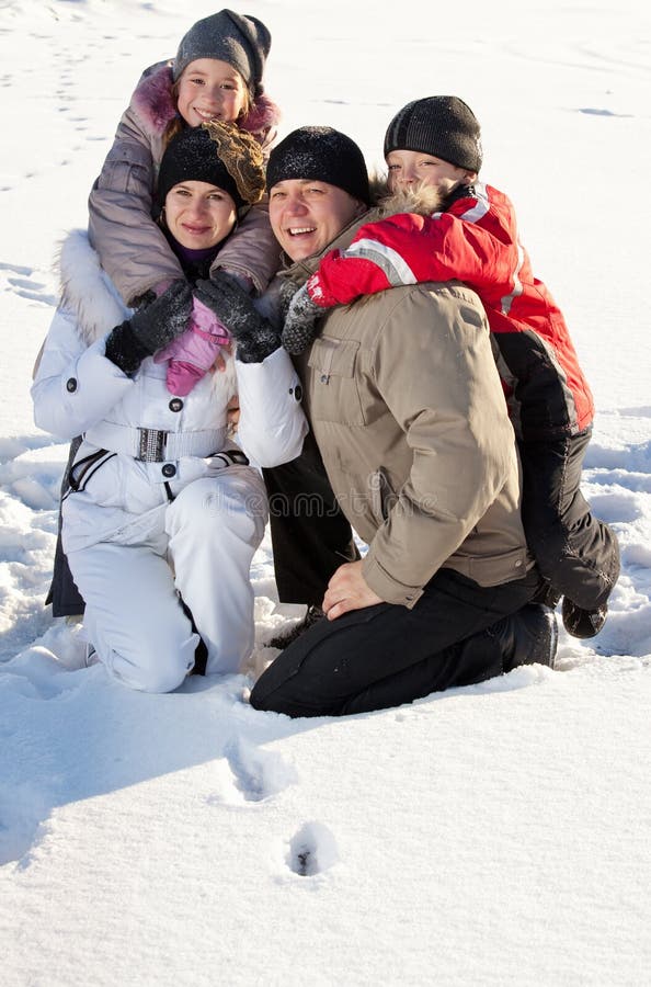 Family on snow stock image. Image of outdoors, snow, people - 45048445