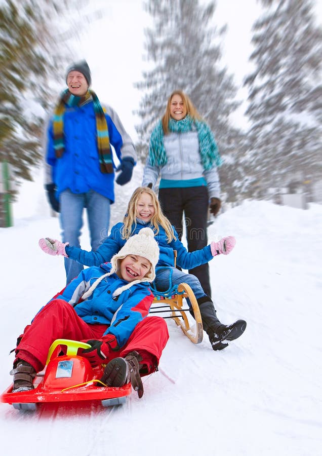 Family-snow-fun 06 stock photo. Image of sisters, security - 15385516
