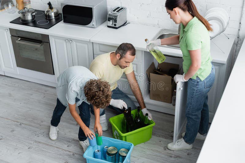 Family with Son Sorting Trash in Stock Photo - Image of care, garbage ...