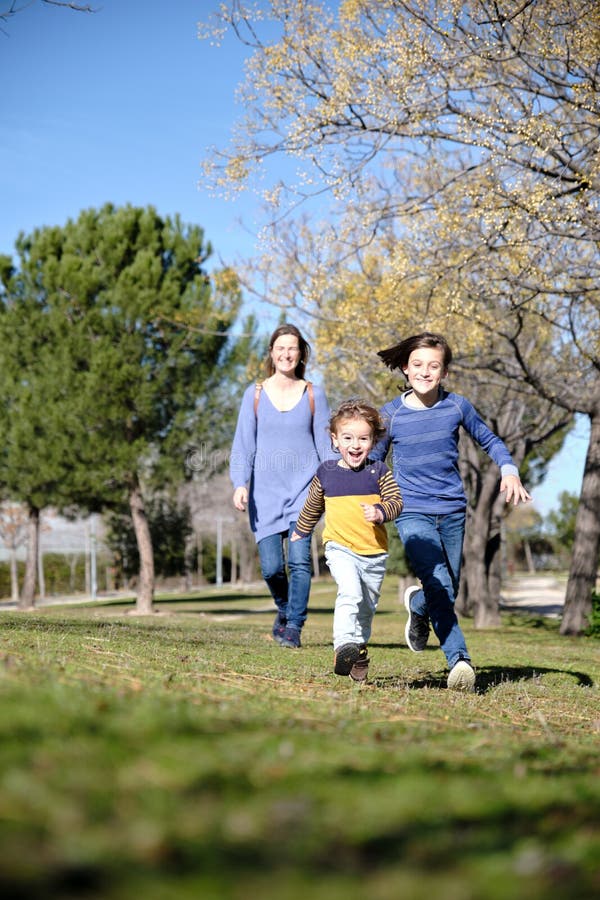 Family Spending Time Outdoors Stock Photo - Image of adult, park: 205992236