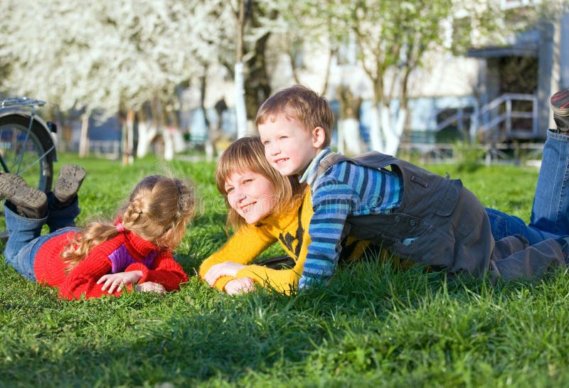 Family in spring park stock image. Image of glad, children - 11060761