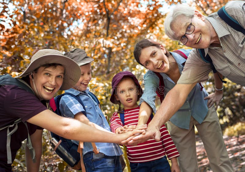 Family Stacking Hands As a Team Stock Photo - Image of adventure, hand ...