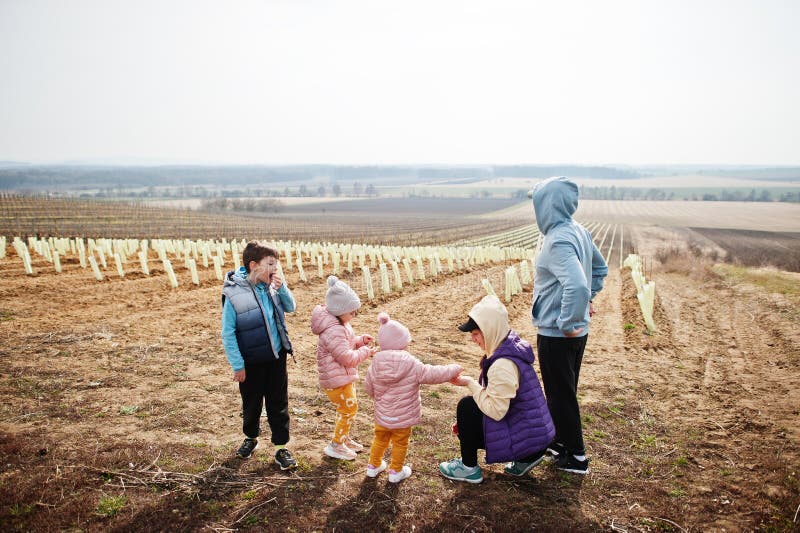 Family Stand Against Vineyard in Early Spring Stock Image - Image of ...