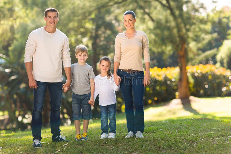 Family standing outdoors stock photo. Image of cute, husband - 41028268