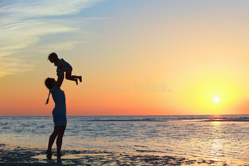 Family at sunset stock image. Image of happiness, sand - 20037367