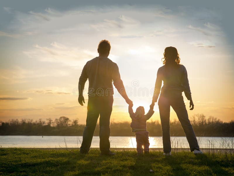 Family at sunset stock image. Image of evening, shadow - 52726579