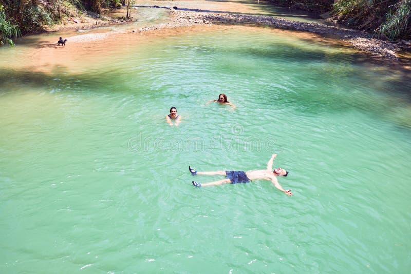 Family Swimming at the River Stock Photo - Image of adventure, relax ...