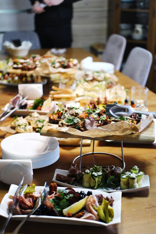 The Family Table is Set with Many Dishes for the Celebration of the ...