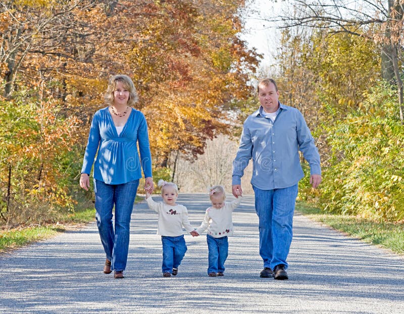 Family Taking a Walk stock photo. Image of american, family - 10978318