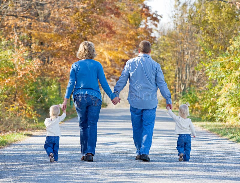 Family Taking a Walk stock photo. Image of american, family - 10978318