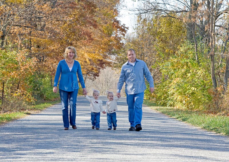 Family Taking a Walk stock photo. Image of american, family - 10978318