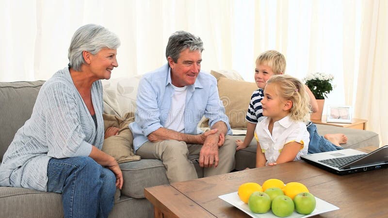 Family talking together stock footage. Video of adult - 39947238