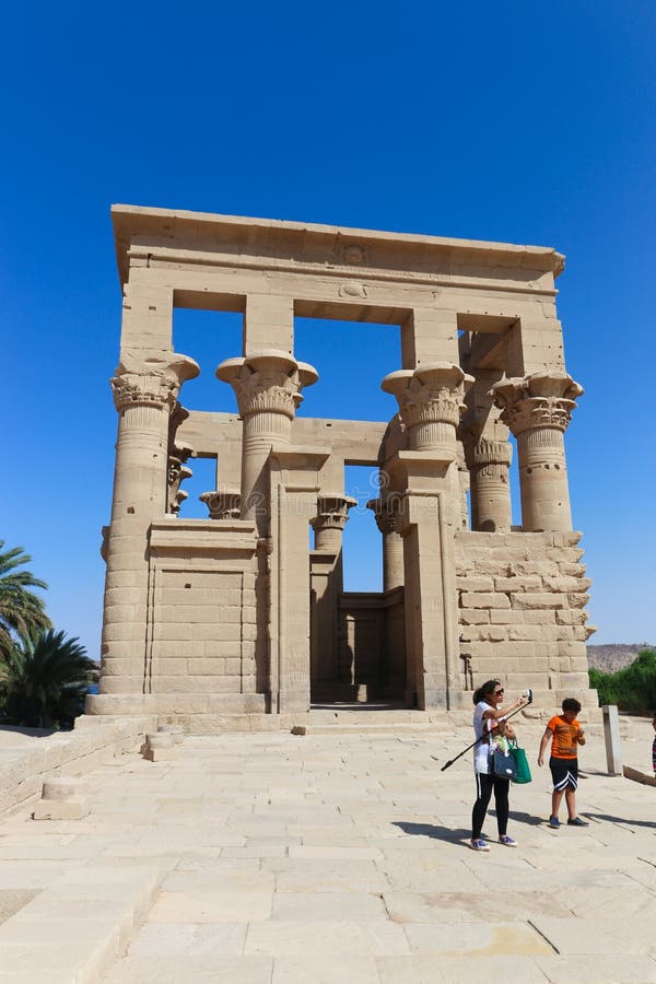 Family at Temple of Isis in Aswan, Egypt Stock Photo - Image of column ...
