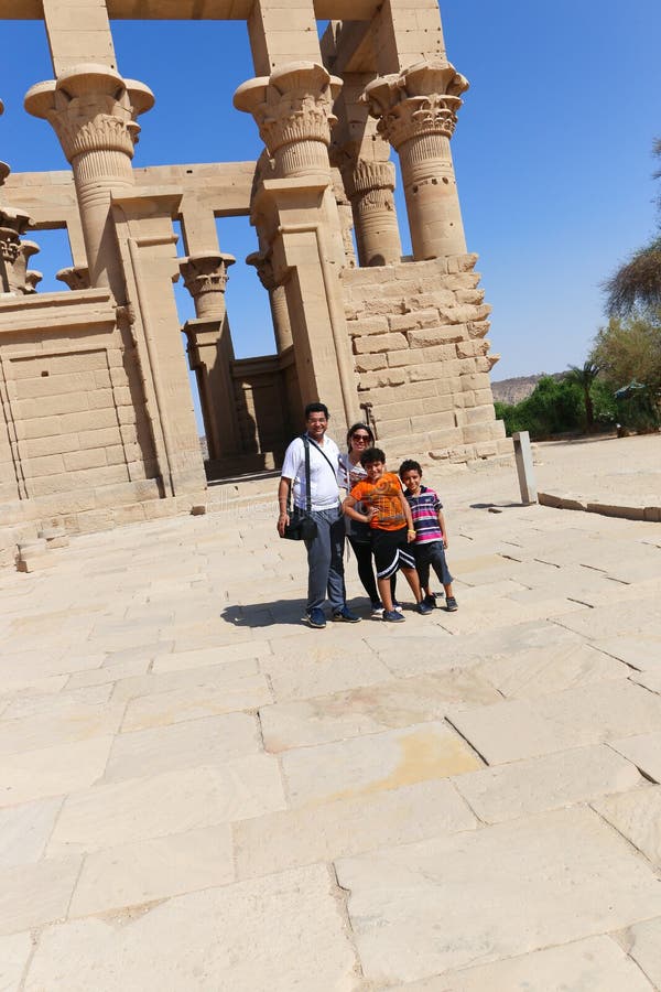 Family at Temple of Isis in Aswan, Egypt Stock Image - Image of columns ...