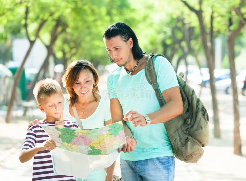 Family Three Searching Way Map Stock Photos - Free & Royalty-Free Stock ...