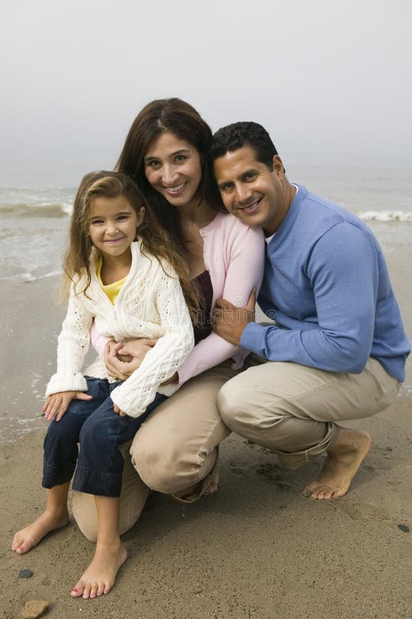 Family Together on Beach stock image. Image of portrait - 30841011