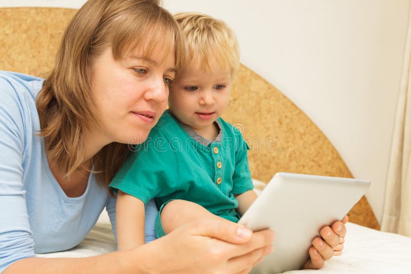 Family with touch pad stock photo. Image of home, baby - 27084188