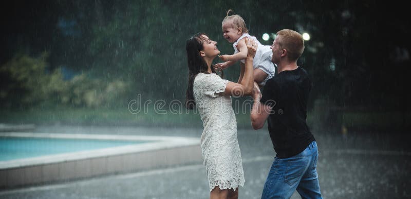 Family under the rain stock photo. Image of adult, american - 50589612