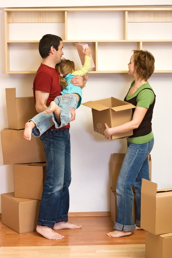Family Unpacking with Lots of Cardboard Boxes Stock Image - Image of ...